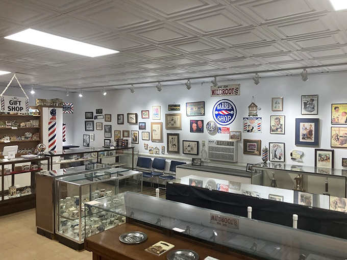 The museum's display cases showcase the evolution of barbering tools &ndash; from straight razors to early electric clippers that revolutionized the profession.