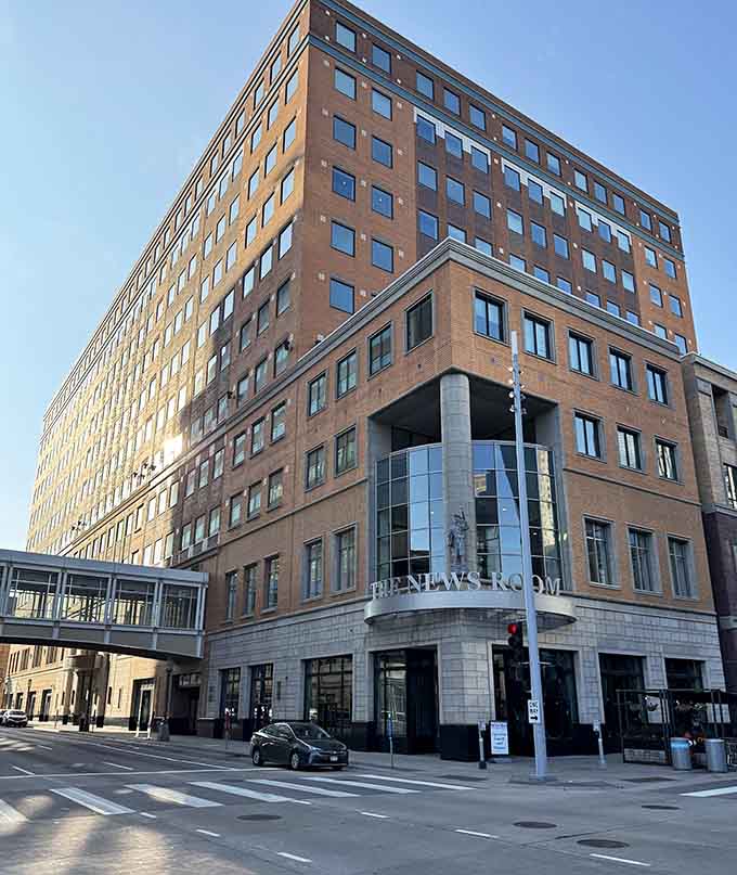 This sleek building houses a restaurant where you can feel like a reporter breaking the biggest story, your dinner order.