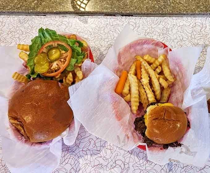 The star of the locomotive lineup – a perfectly cooked grass-fed beef patty topped with melty cheese and fresh veggies on a toasted bun.