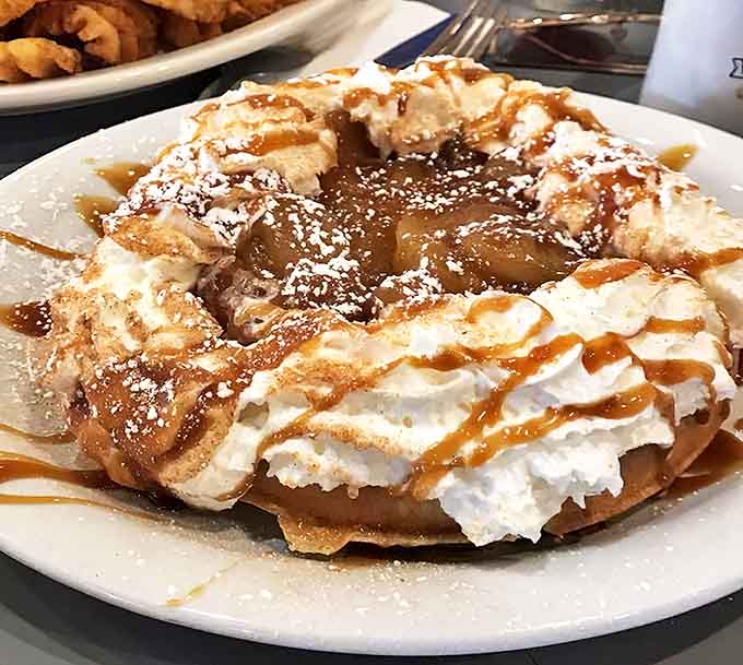 Apple cinnamon waffle perfection: where fruit meets indulgence in a sweet symphony that makes you question why all breakfasts can't be this magnificent.