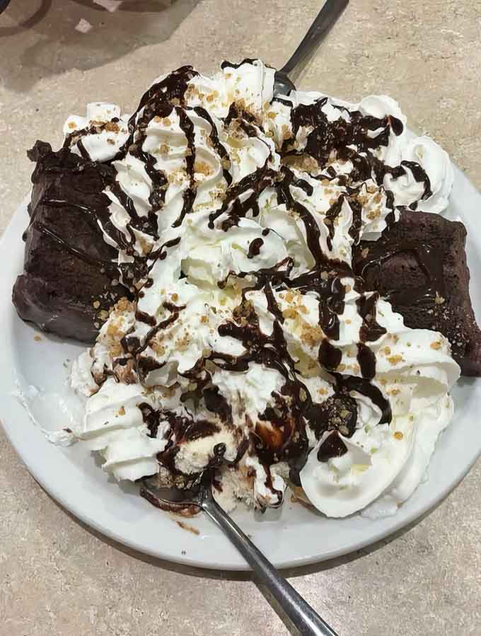 The Time Bomb lives up to its name with chocolate cake, ice cream, and enough whipped cream to require strategic planning.