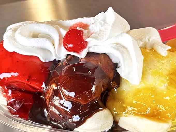 This banana split looks like it requires an engineering degree to eat properly, and honestly, that's part of the fun.