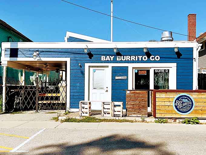 Bay Burrito's vibrant blue exterior promises a flavor fiesta inside &ndash; proof that big taste can come from the smallest buildings.