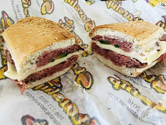 The Beef Eater Sandwich arrives like a flavor torpedo, loaded with roast beef and enough toppings to require strategic eating.