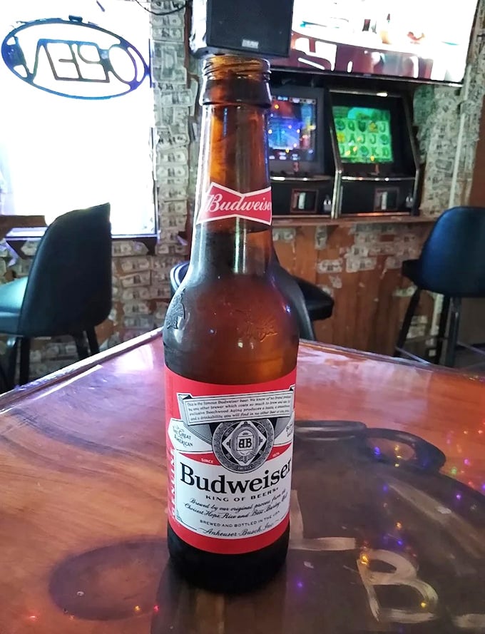 Cold Budweiser against the backdrop of thousands of dollars &ndash; a quintessential Little Brown Jug experience.