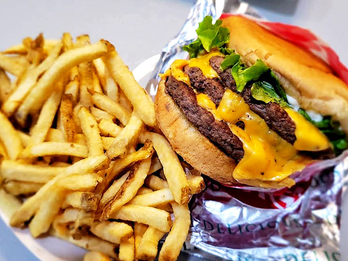 Cheeseburger with Fries: The classic combo elevated &ndash; a hand-formed patty paired with golden fries that disappear one "just one more" at a time.