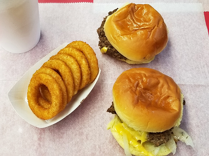 The perfect sidekick to any burger &ndash; golden onion rings with that satisfying crunch that makes you wonder why you'd ever order anything else.