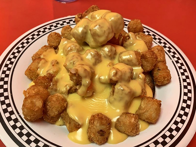 The famous horseshoe &ndash; where french fries and cheese sauce create a golden avalanche over crispy chicken. Fork required, restraint optional.