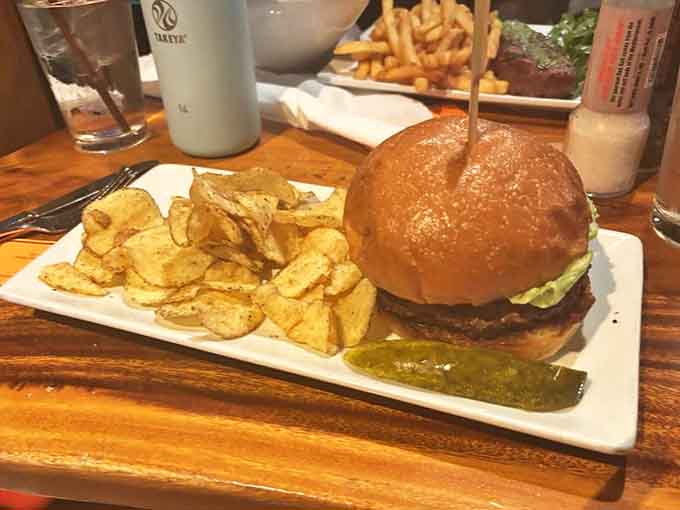 The Beast Burger doesn't just satisfy hunger, it conquers it! Elk, wagyu, and wild boar create a flavor symphony on a pretzel bun.