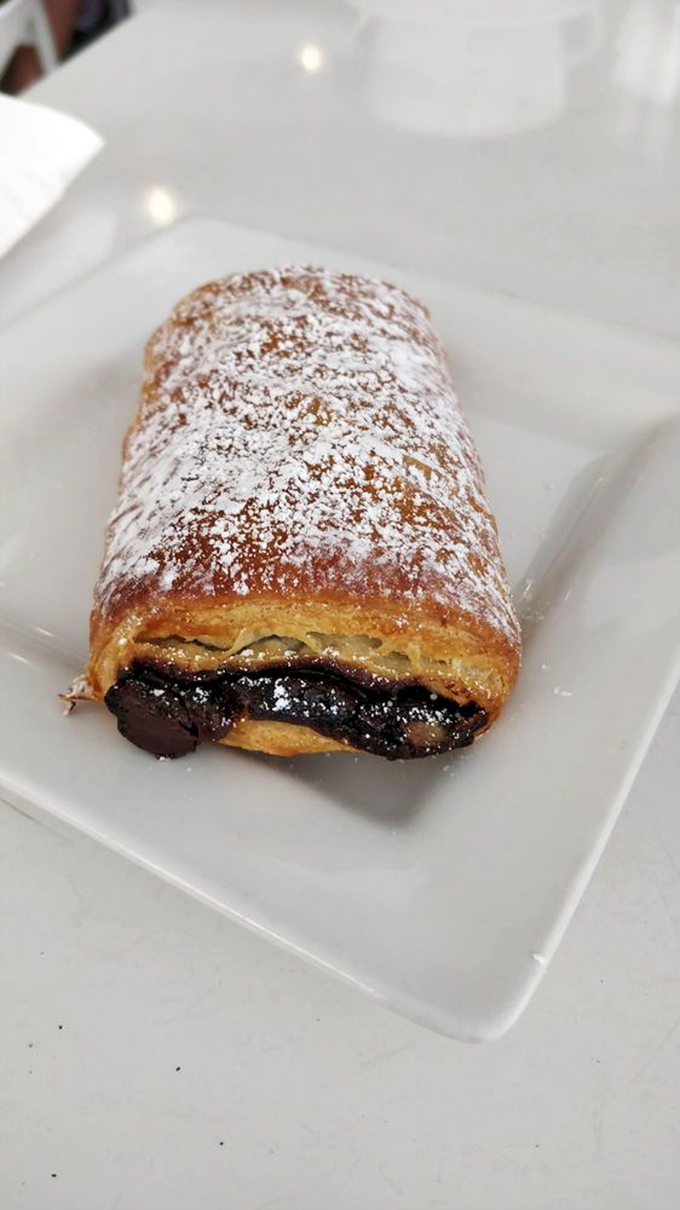 Chocolate croissant: The chocolate-filled dream that makes you question why all breakfast pastries don't come with molten chocolate centers.