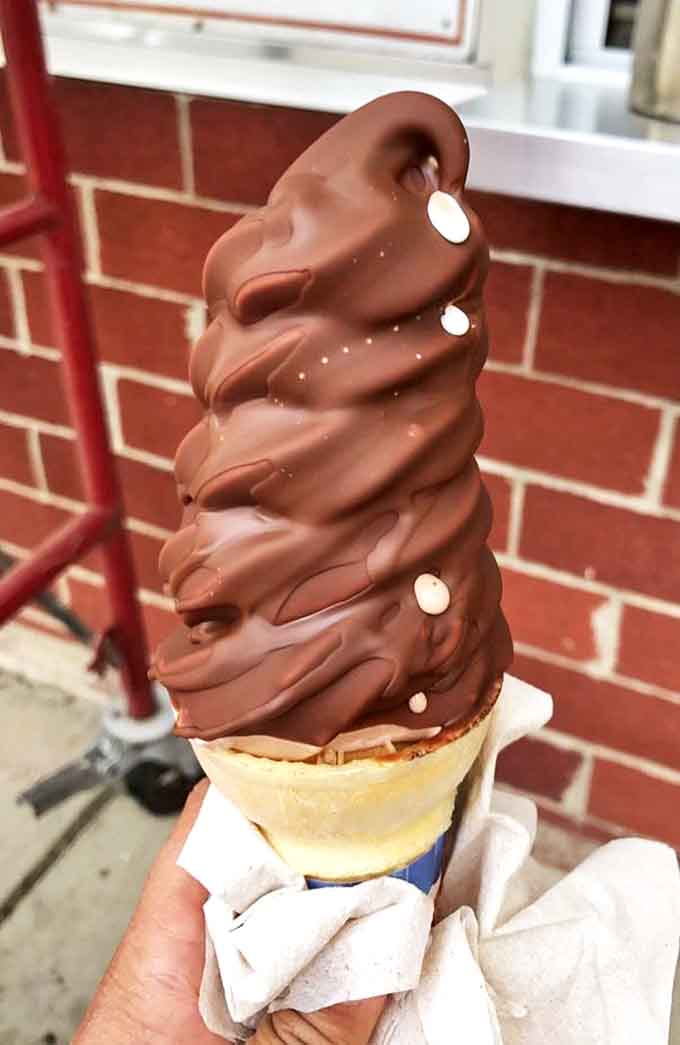 Chocolate-dipped soft serve creates the perfect armor around creamy vanilla, a study in temperature and texture contrasts.