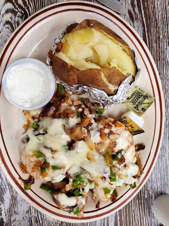 When dinner looks this good with that fluffy baked potato, you realize breakfast places do everything better.