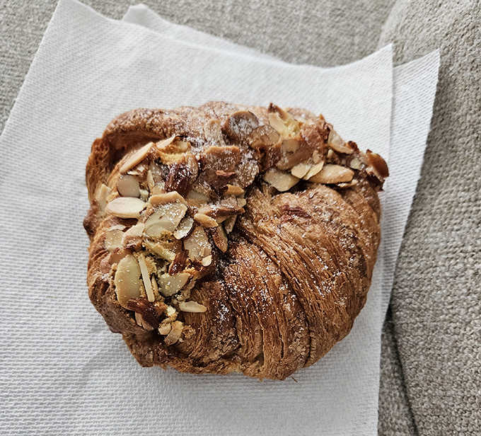 Croissant: Layers upon buttery layers create a pastry architecture so perfect you almost feel guilty destroying it. Almost.