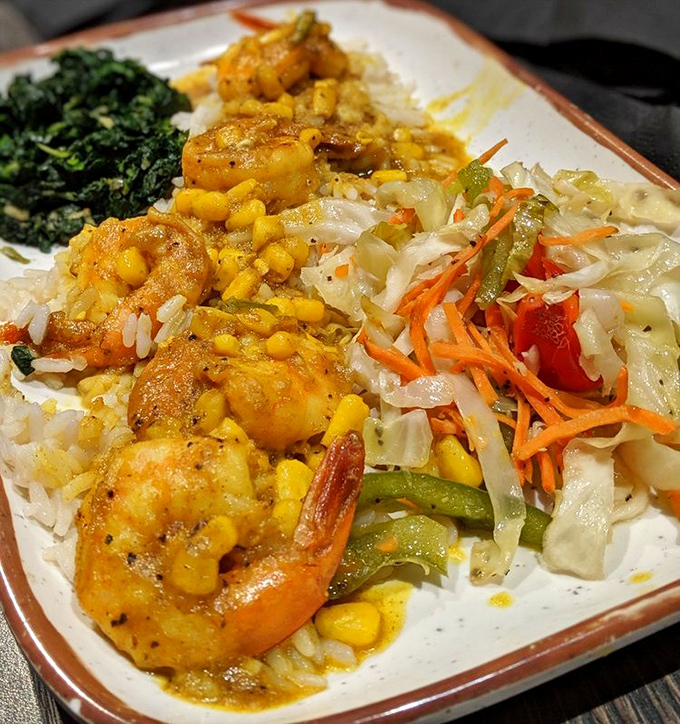 Sunshine on a plate! These curry shrimp practically sing with bright flavors, nestled on rice with fresh vegetables providing the perfect backup chorus.
