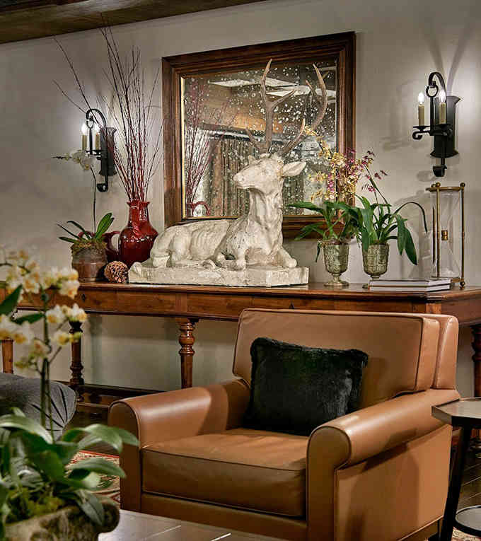 Every corner tells a story, with carefully curated d&eacute;cor that feels collected rather than manufactured &ndash; like this stately deer watching over guests.