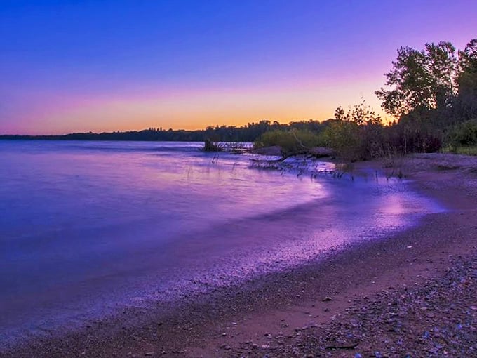 As twilight embraces the shoreline, Delaware Park reveals its most serene personality, perfect for quiet contemplation.