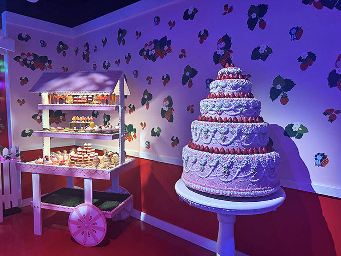 A dessert display that would make Willy Wonka question his career choices &ndash; that cake isn't just for looking, it's for experiencing.
