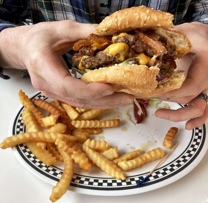 The double cheeseburger deluxe &ndash; where beef patties achieve that magical balance between juicy interior and caramelized exterior. Burger nirvana!