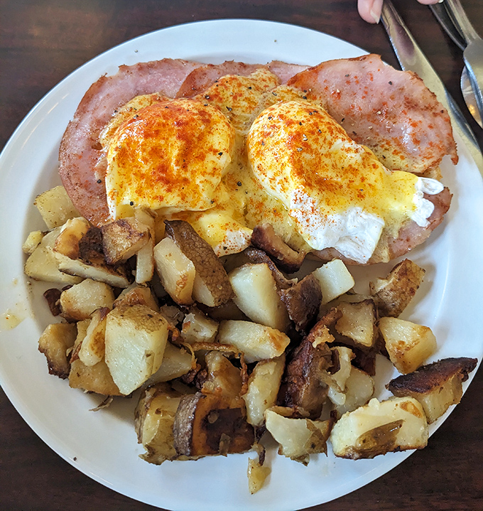 Eggs Benedict that would make a banker invest his last dollar &ndash; perfectly poached eggs atop Canadian bacon with hash browns crispy enough to break into.