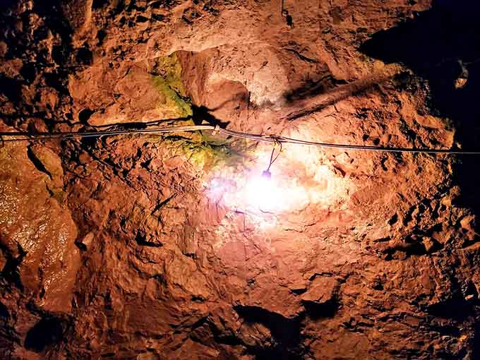 Nature's artwork revealed: copper deposits still visible in the mine walls, their green patina a signature of age.