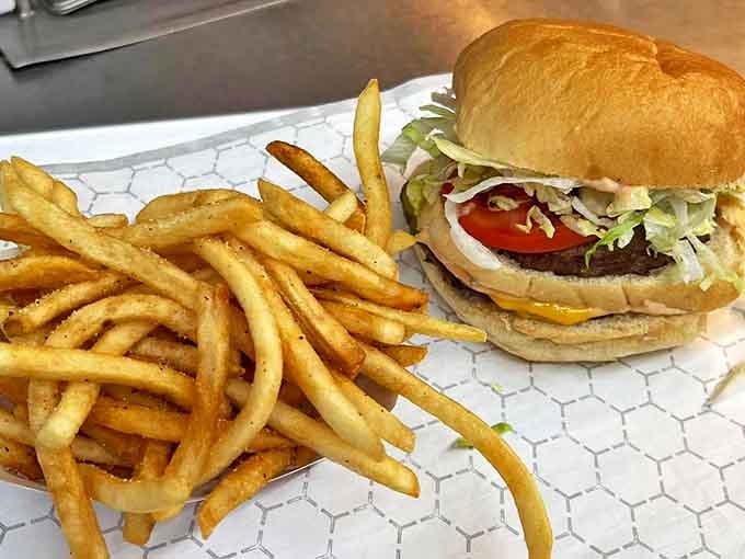 The classic burger and fries combo at Earl's isn't reinventing the wheel – it's reminding us why the wheel was such a brilliant invention in the first place.