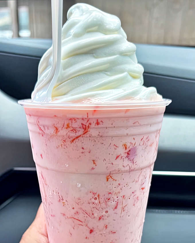 Pink, creamy, and topped with a swirl of whipped cream, this fruit salad milkshake proves that healthy ingredients can create decidedly indulgent results.