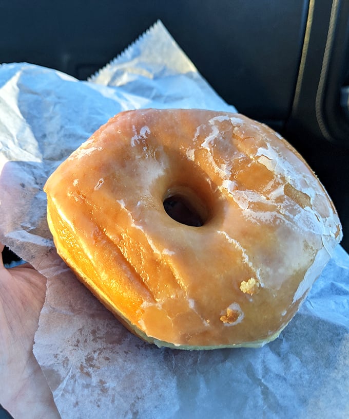 The glazed donut &ndash; deceptively simple, impossibly perfect. That sheen isn't just sugar, it's a glistening promise of joy.