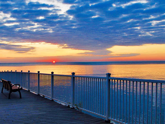 Sunset transforms Glencoe's pier into a front-row seat for nature's nightly light show, painting the sky in colors no artist could fully capture.