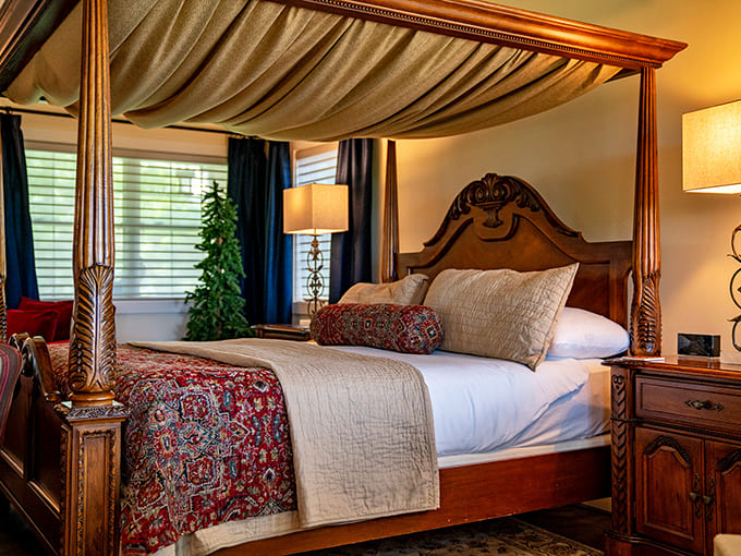 A four-poster bed fit for royalty, draped in rich fabrics and bathed in natural light &ndash; where dreams come with a thread count.