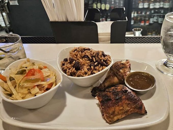 When your jerk chicken dinner arrives with rice, peas, and all the fixings, you'll understand why people drive from three towns over.