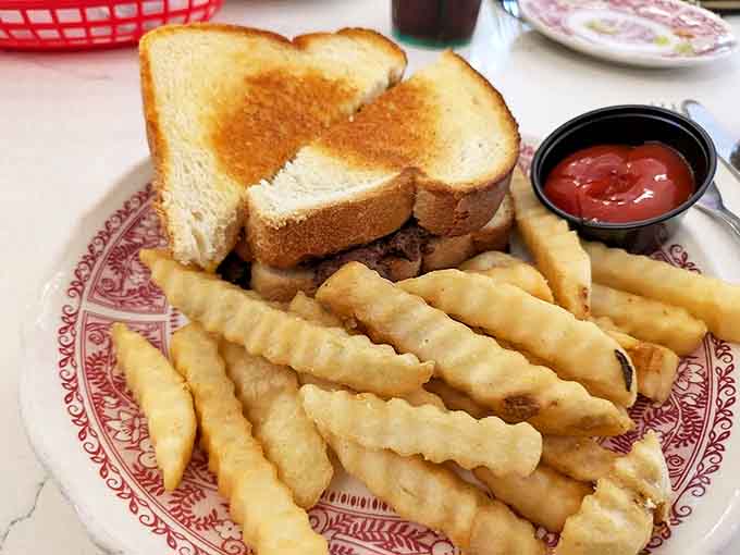 Comfort food perfection – golden-brown grilled cheese and crinkle-cut fries prove this parlor knows its way around savory classics too.