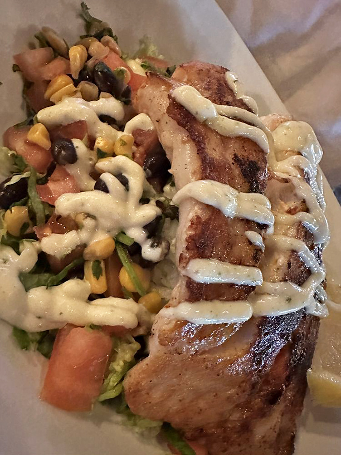 Florida's favorite fish takes center stage atop fresh veggies&mdash;a colorful seafood symphony that's as beautiful to behold as it is to devour.