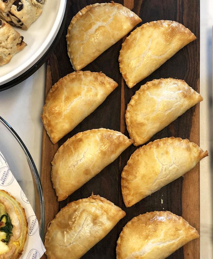 These aren't just empanadas&mdash;they're edible art. The flaky pastry shatters just right, revealing fillings that make you wonder why you'd eat anything else.