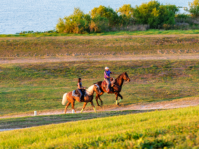 Horseback riders enjoy the gentle slopes and winding trails, adding a touch of Wild West to this Floridian landscape.