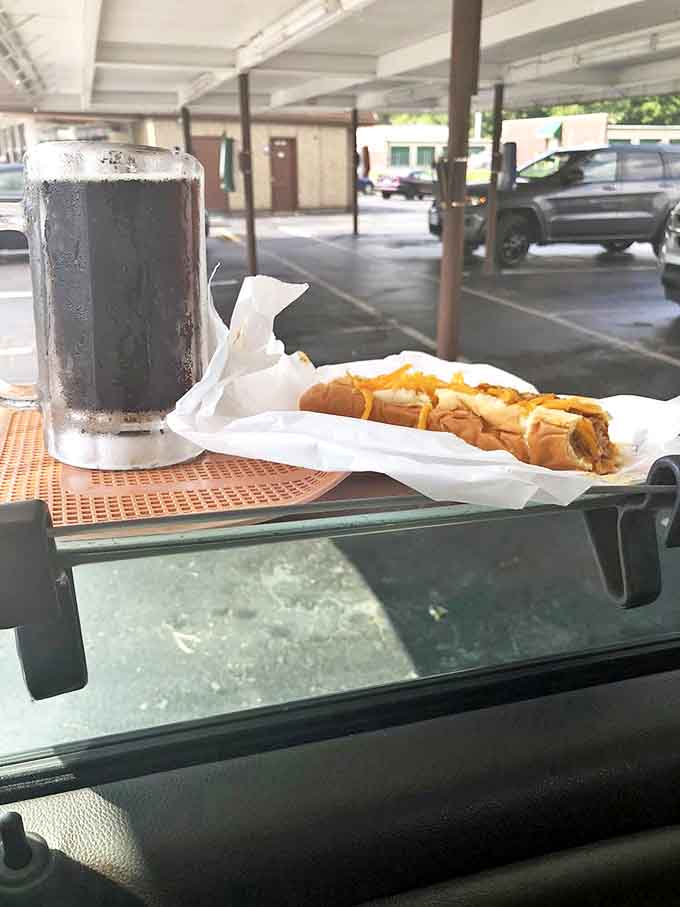 Car dining at its finest &ndash; a classic hot dog and ice-cold root beer, the dashboard becomes your dining table at this retro spot.
