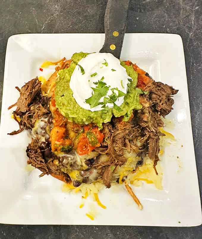 Huevos Rancheros stack layers of flavor and texture into a morning masterpiece that makes ordinary breakfast seem like a missed opportunity.