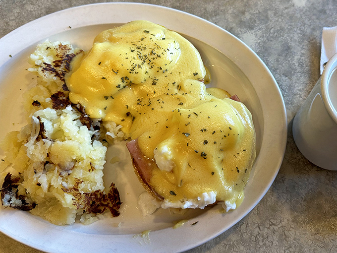Eggs Benedict that would make a French chef nod in approval &ndash; hollandaise sauce cascading over perfectly poached eggs like morning sunshine.