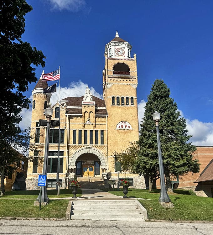 Iron County Courthouse commands attention with its yellow brick grandeur &ndash; architecture that tells stories without saying a word.