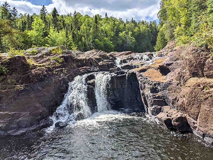 Judge C.R. Magney State Park's Devil's Kettle waterfall remains nature's perfect mystery &ndash; half a river vanishing underground like magic without explanation.