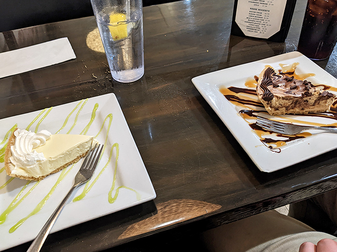 Dessert heaven on two plates &ndash; key lime pie's tangy brightness alongside chocolate peanut butter pie's rich decadence. Why choose when you can have both?