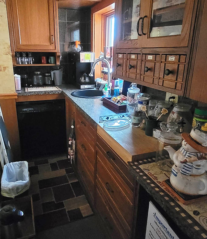 The kitchen blends historic charm with modern convenience &ndash; proof that you can make your morning coffee without firing up a wood-burning stove.