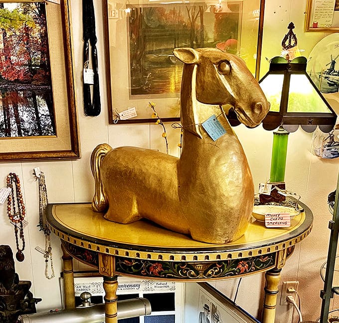 Kneeling Gold-Toned Horse Statue: This majestic golden horse seems ready to gallop off its decorative table, bringing a touch of regal splendor to any home.