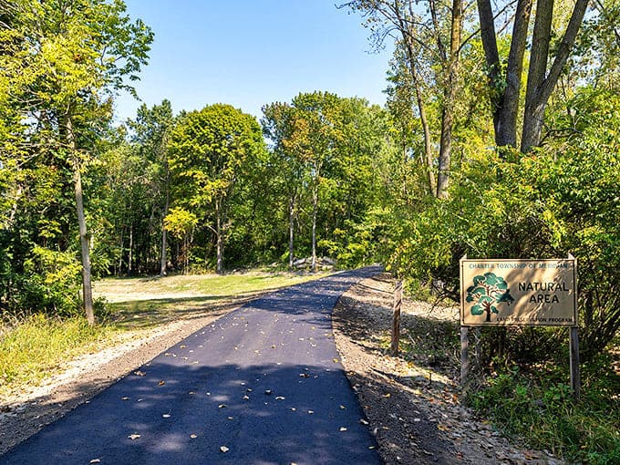 The paved trail winds through natural areas where wildlife and joggers share territory in a delightful urban-nature compromise.