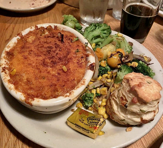 A complete plate of happiness: lobster mac and cheese paired with seasonal vegetables and a biscuit that could convert any carb-avoider.