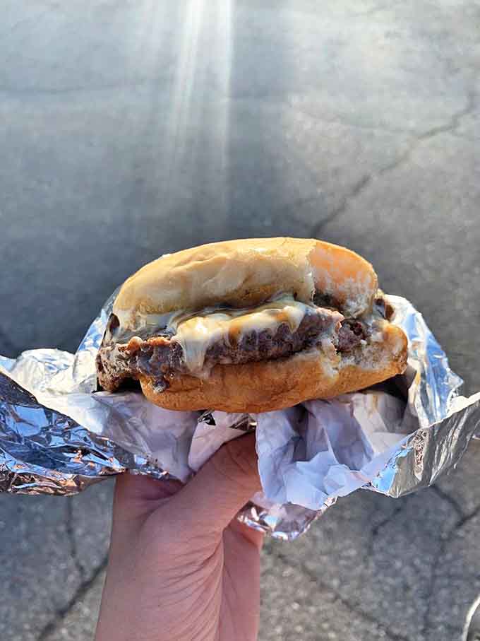 The Mushroom Swiss Burger – a hand-formed patty topped with sautéed mushrooms and melty cheese that might just ruin all other burgers for you forever.