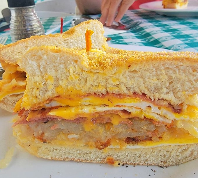 This sandwich isn't just stacked &ndash; it's an architectural marvel of melty cheese, crispy bacon, and egg that makes you wonder why you'd eat anything else.