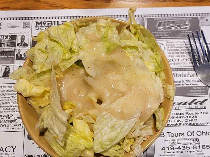 Even the salads get the royal treatment here, served fresh and generous with your choice of classic dressings.