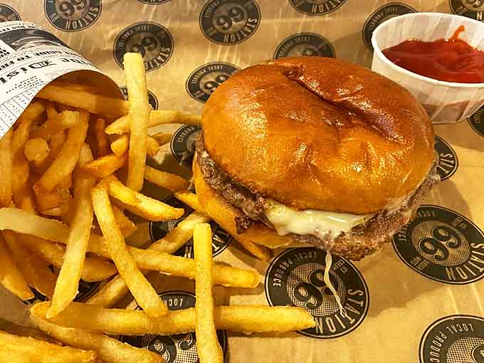 The olive burger with fries – Michigan's answer to world peace, where briny olives meet savory beef in a harmony that makes taste buds stand and applaud.
