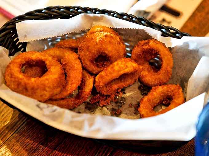 Onion rings that actually stay intact when you bite them? It's not sorcery, it's just The Village Tavern doing things the right way.
