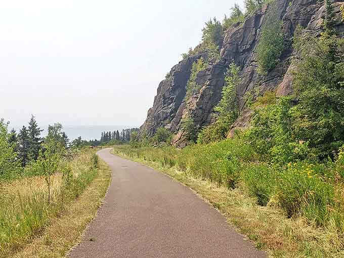 Where rugged meets refined: a smooth path carved alongside ancient cliff faces that have witnessed centuries of Lake Superior's moods.